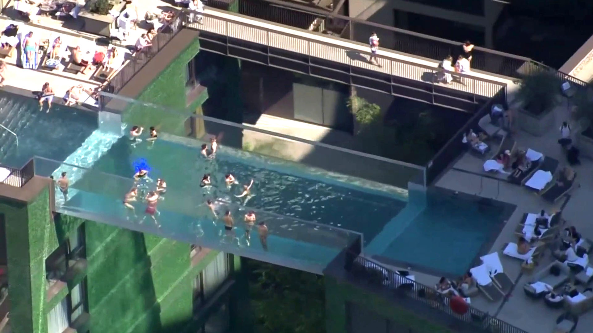 Watch TODAY Highlight: Transparent ‘Sky Pool’ suspends swimmers high ...